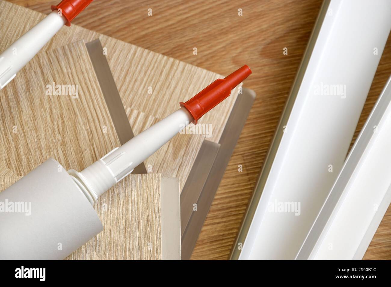 Set of items for PVC ceiling indoor works. Assembly adhesive bottles ...