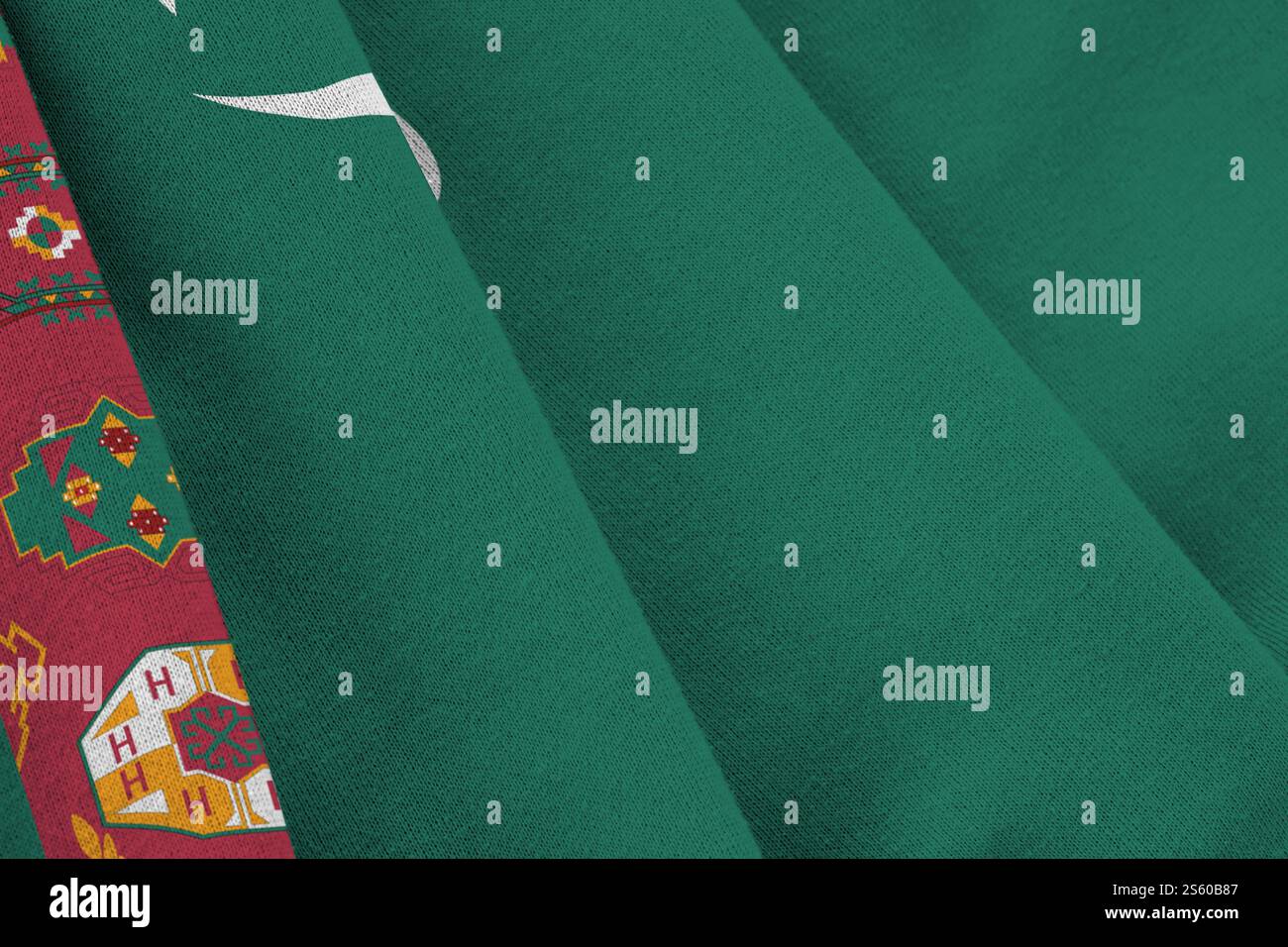 Turkmenistan flag with big folds waving close up under the studio light ...