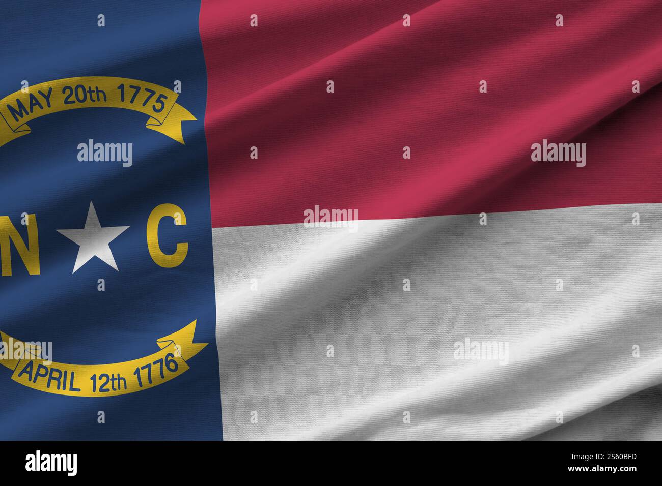 North Carolina US state flag with big folds waving close up under the ...