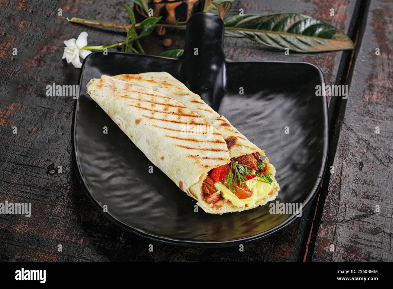 Shawarma roll with chicken and vegetables Stock Photo - Alamy