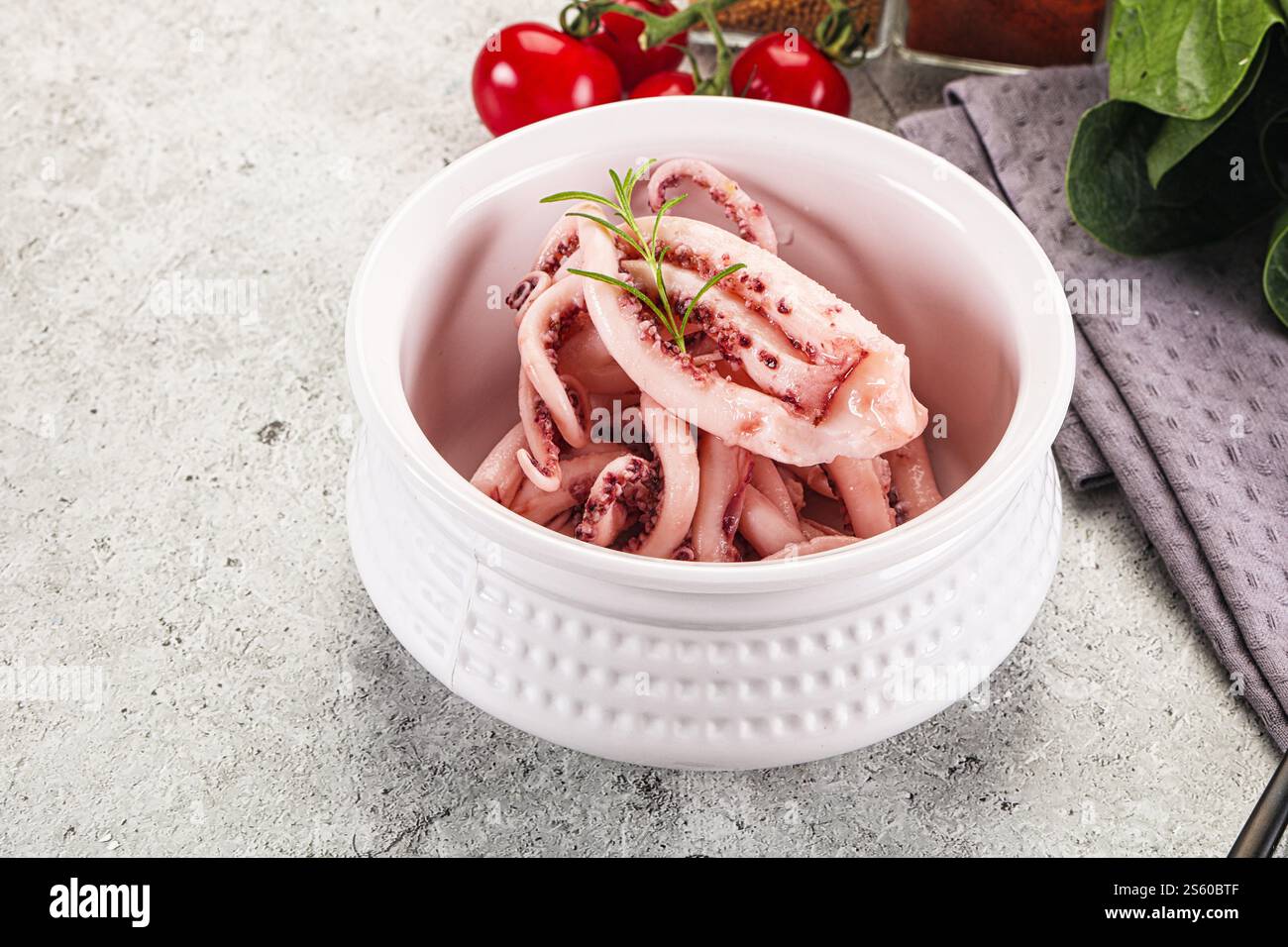 Marinated squid tentacles in the bowl for snack or salad Stock Photo ...