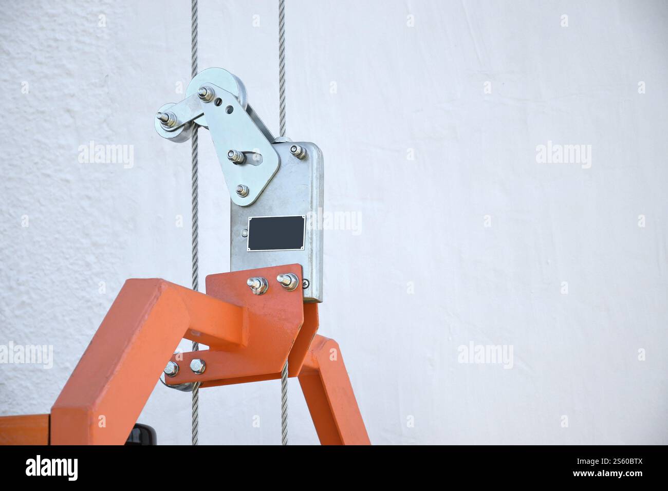 Safety lock as part of suspended wire rope platform for facade works on ...