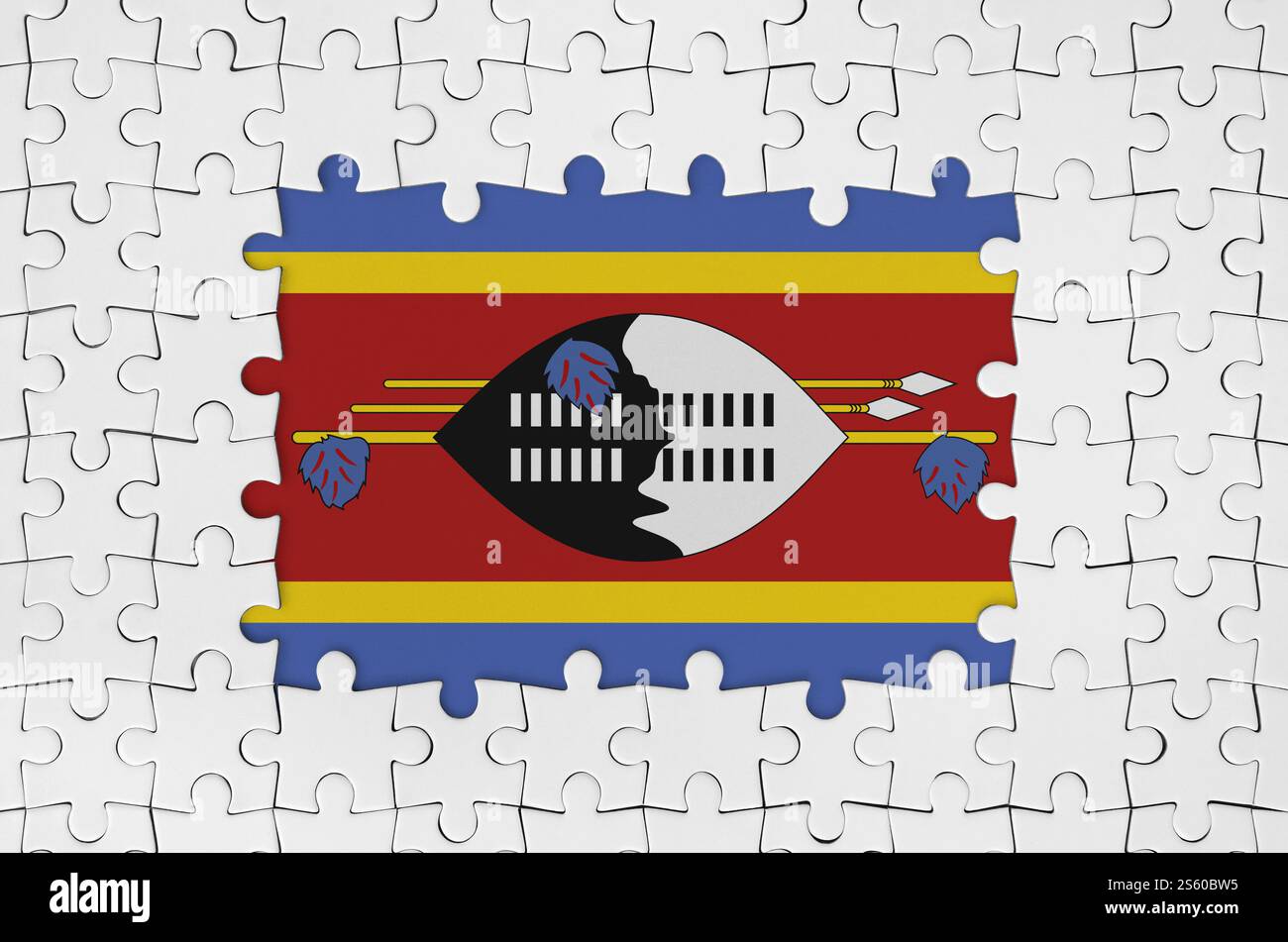 Swaziland flag in frame of white puzzle pieces with missing central ...