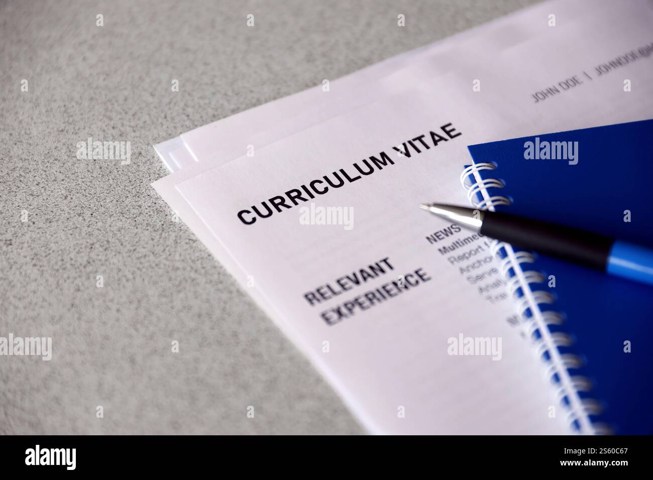 Top view of stack of office documents including resume and cv forms on ...