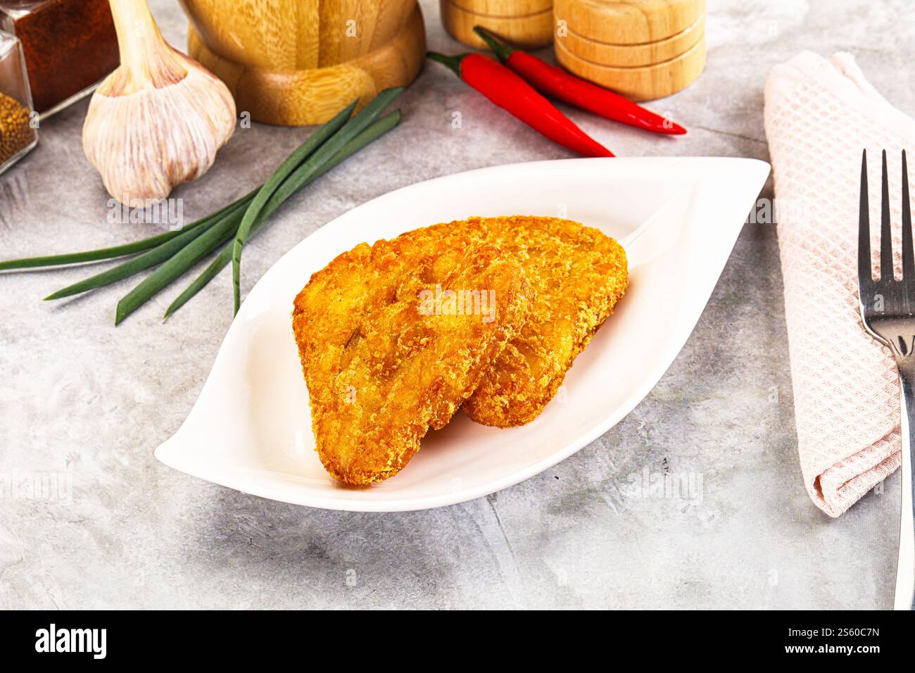 Fried potato hash brown snack for breakfast Stock Photo - Alamy