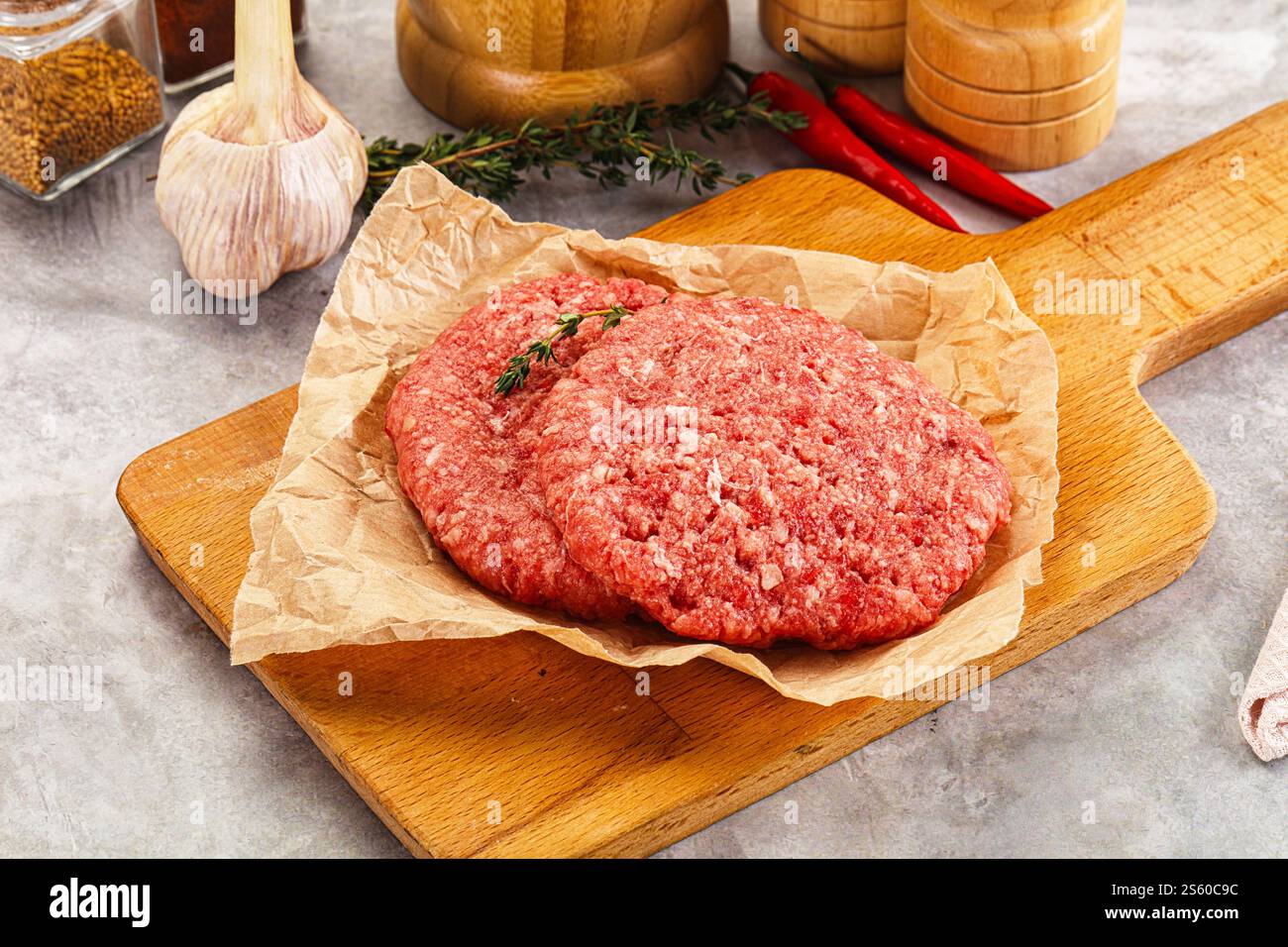 Raw beef minced meat cutlet for grill Stock Photo - Alamy