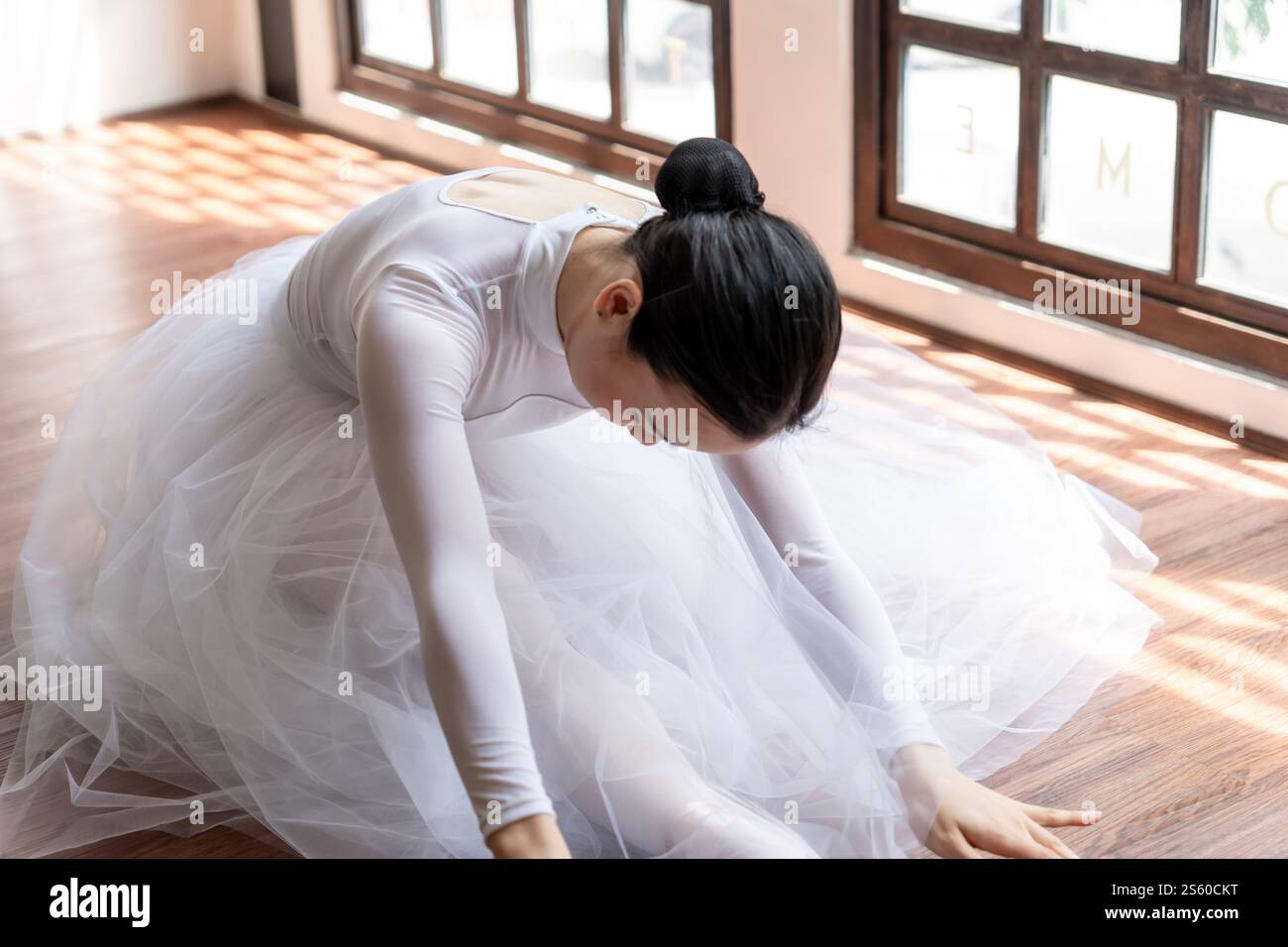 Asian girl ballet dancer creative performance with white skirt ...