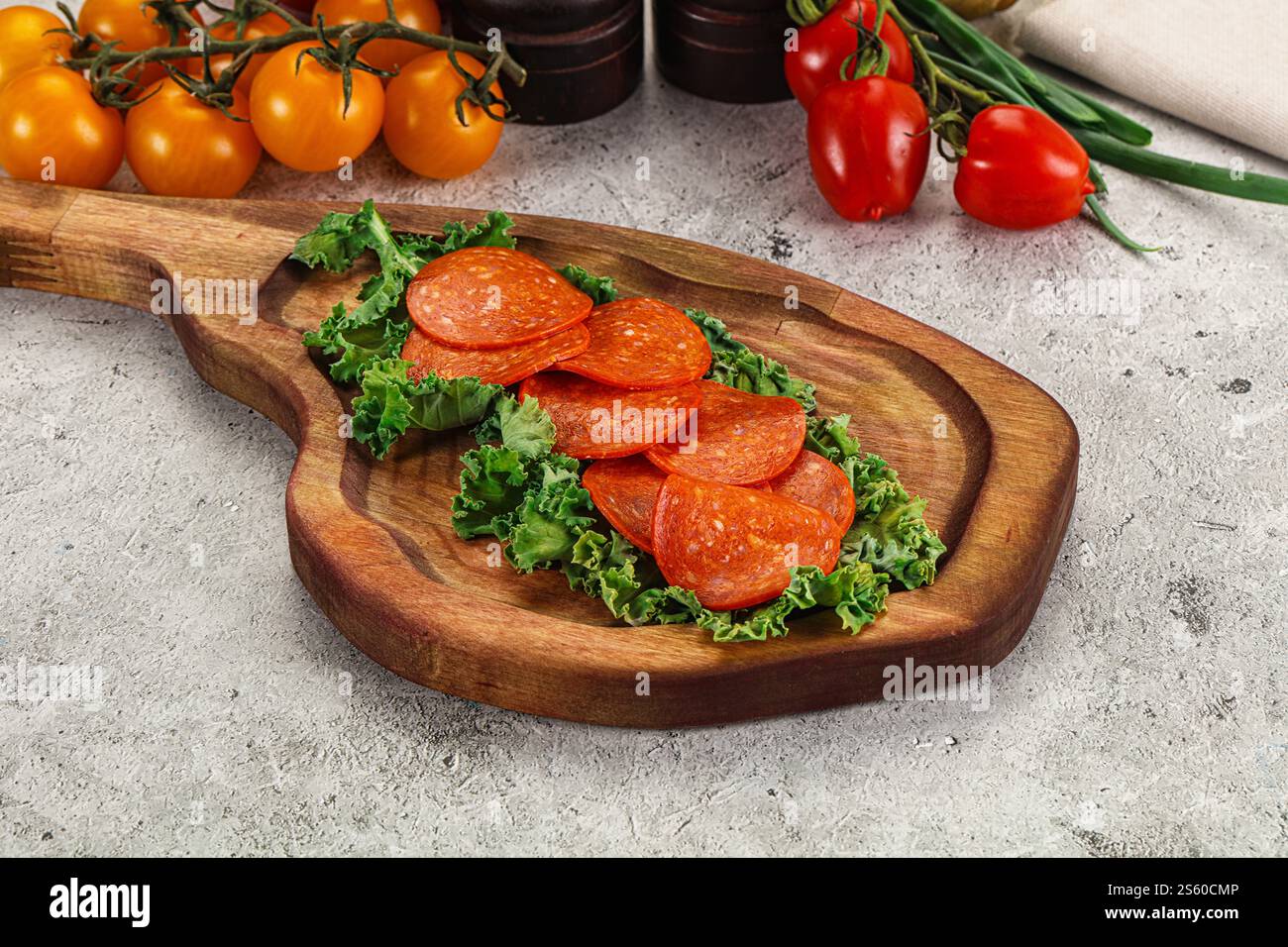 Spanish salami cured chorizo sausage slices Stock Photo - Alamy