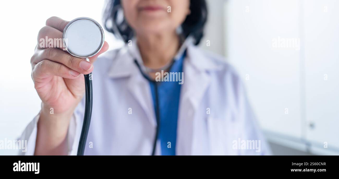 Doctor holding stethoscope in hand Doctor check body by stethoscope ...