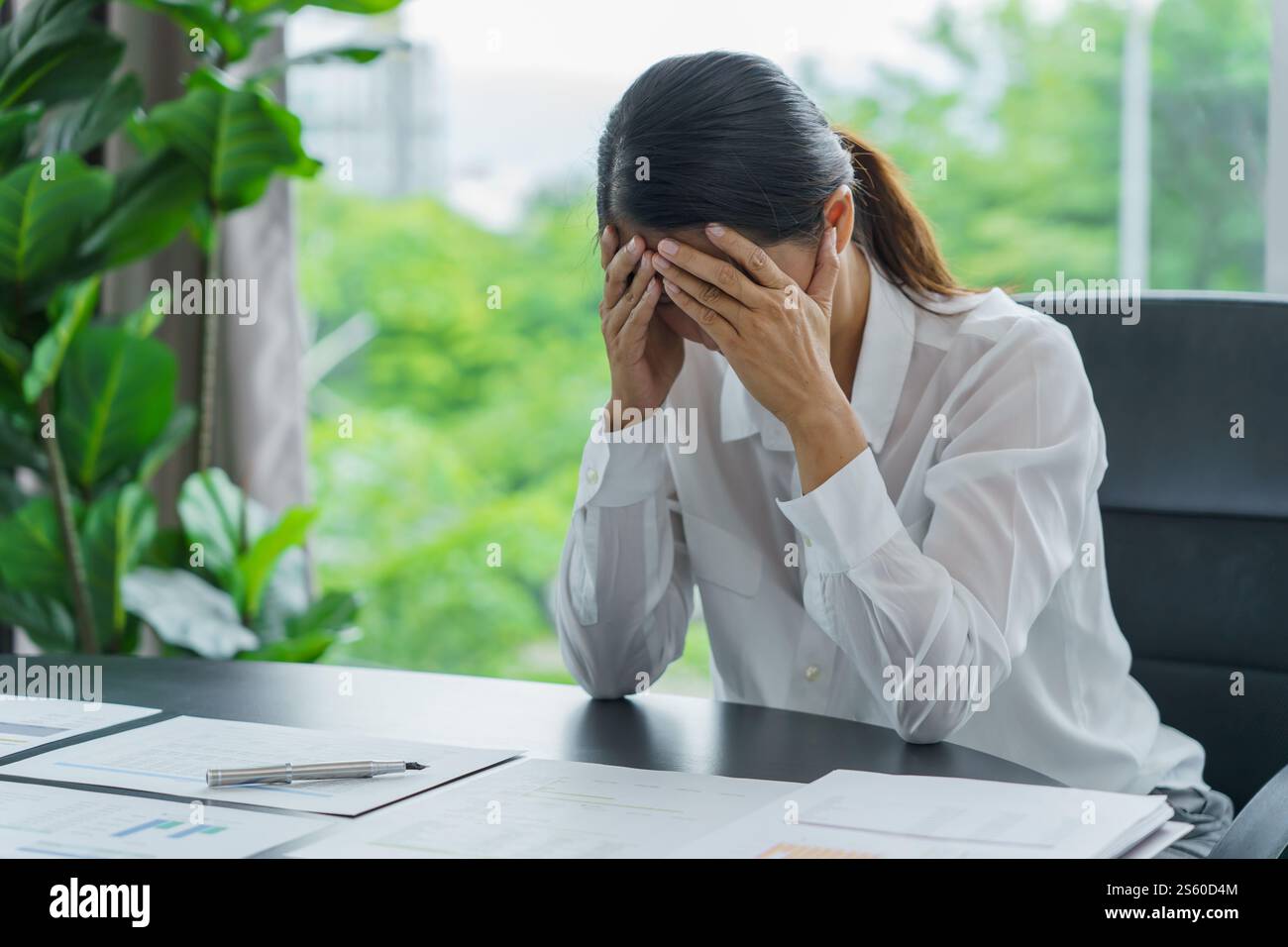Burnout concept. Asian Business woman touching forehead having headache ...