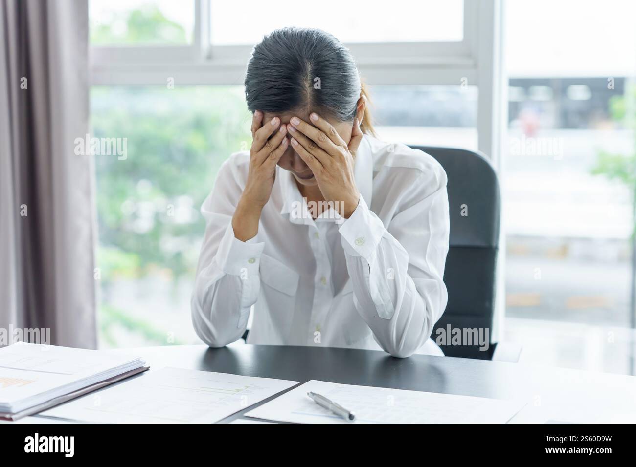 Burnout concept. Asian Business woman touching forehead having headache ...