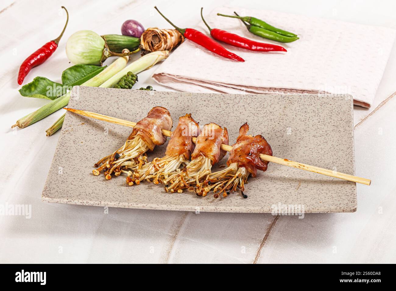Thai Street foof satay with bacon and mushroom enoki skewer Stock Photo ...