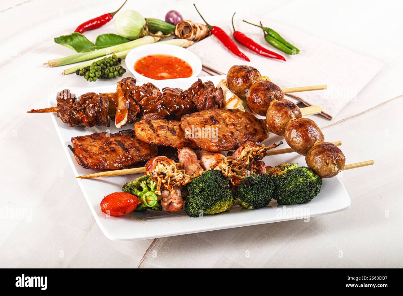 Asian grilled skewer assortment satay with beef, porl, chicken and ...