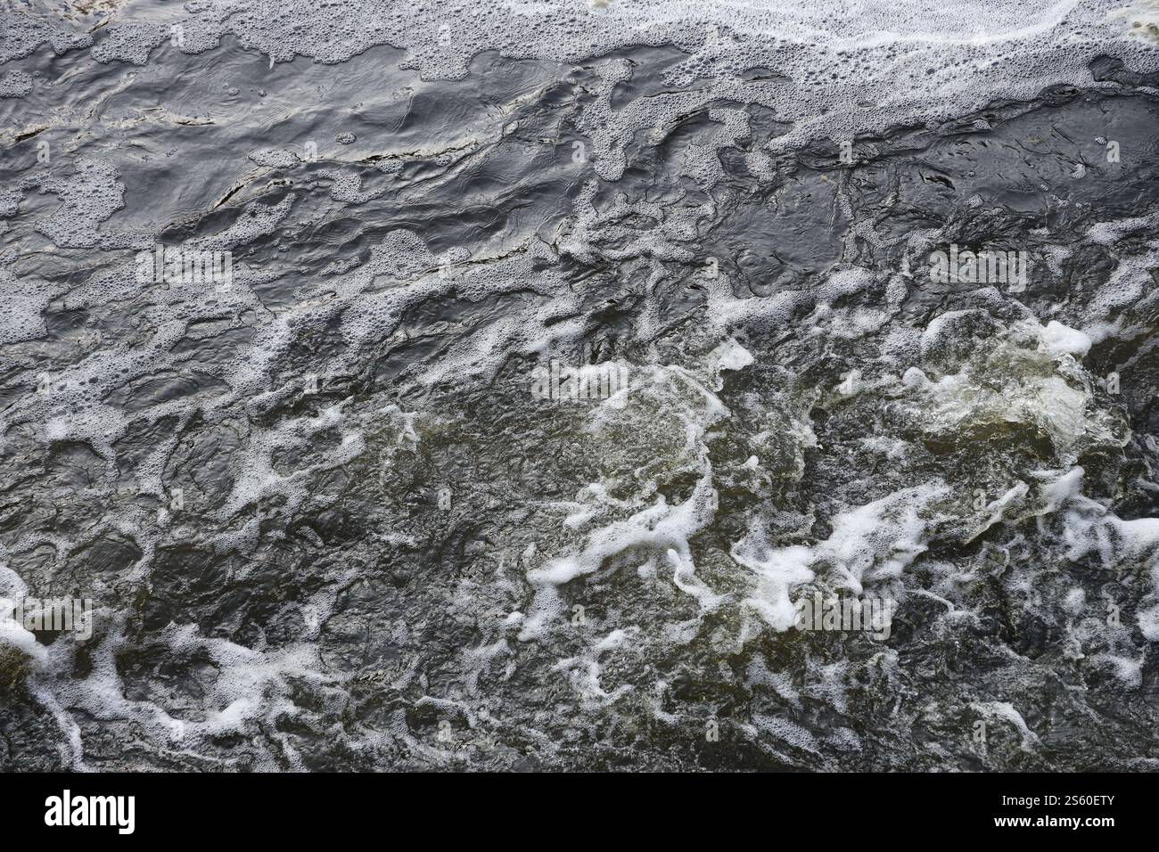 Waves of water of the river and the sea meet each other during high ...