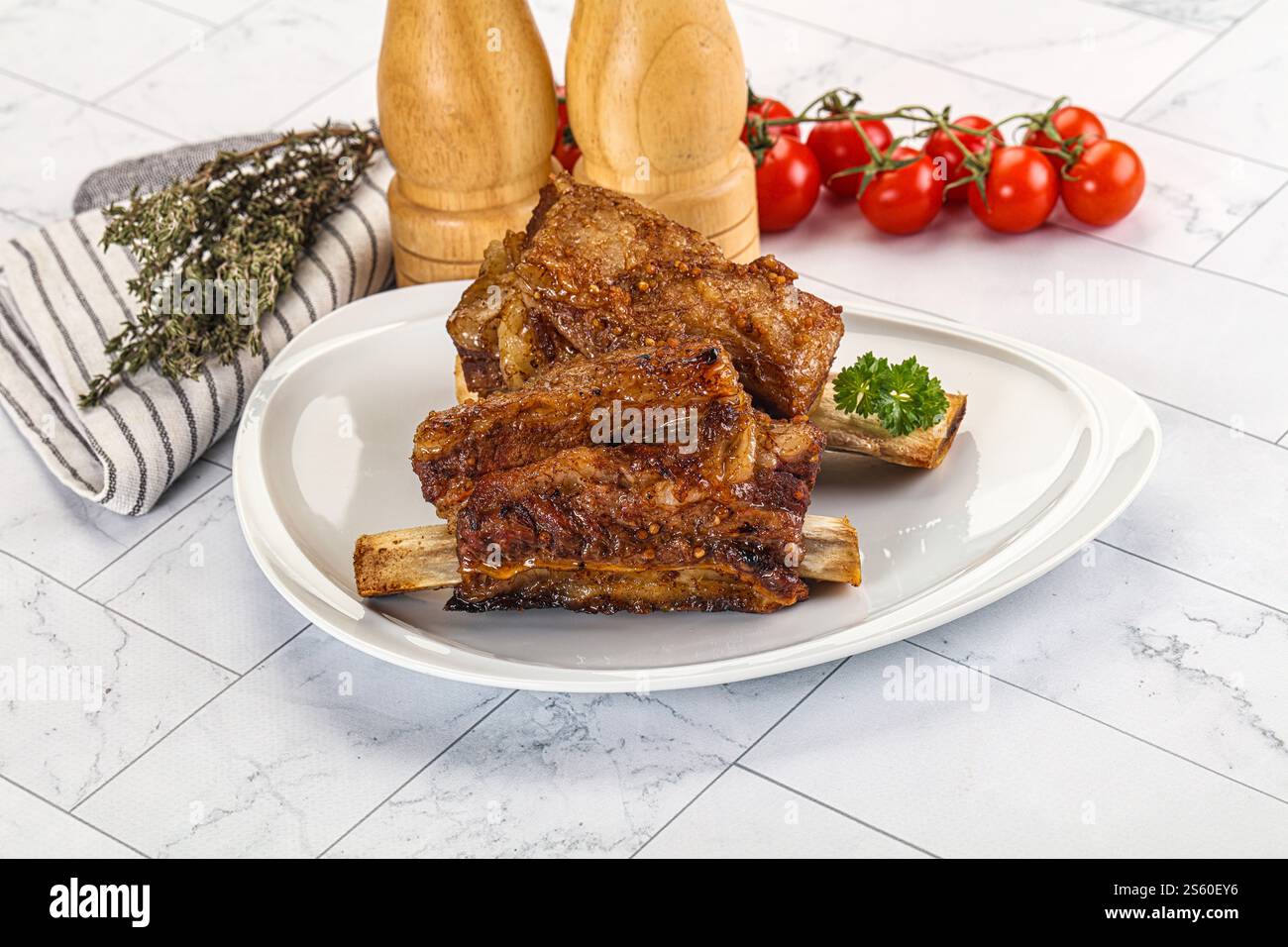 Baked beef ribs with marinade with seasoning Stock Photo - Alamy