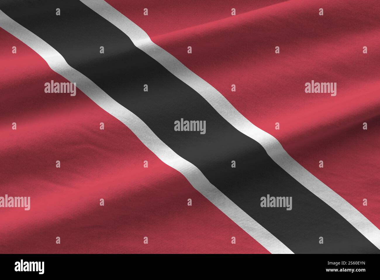 Trinidad and Tobago flag with big folds waving close up under the ...
