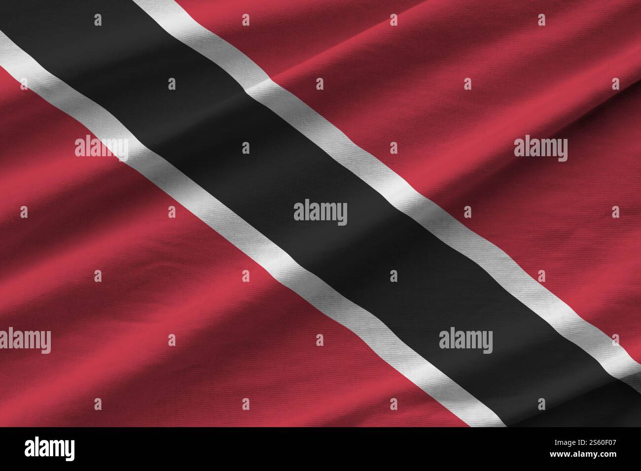 Trinidad and Tobago flag with big folds waving close up under the ...