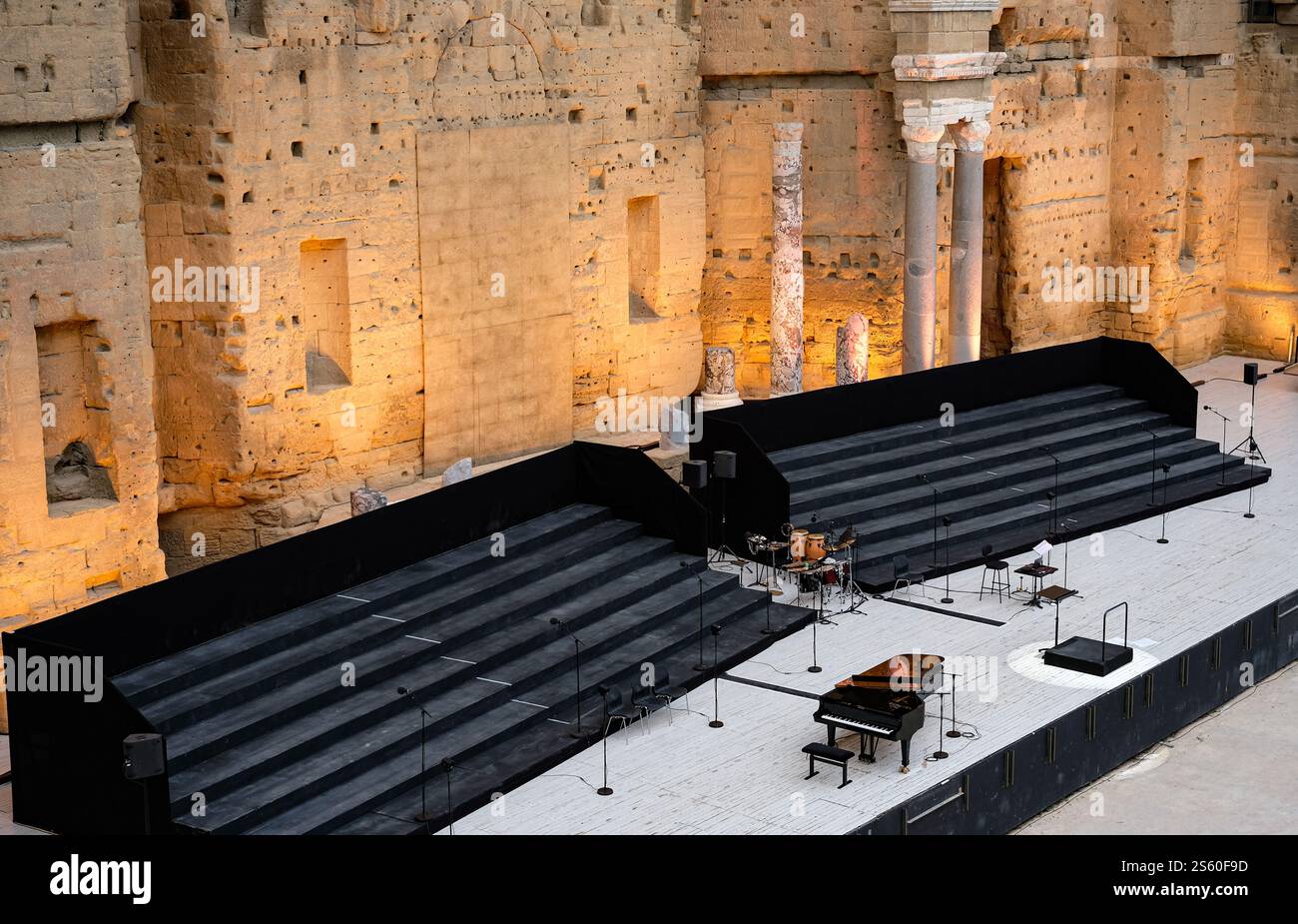 Empty illuminated stage. Сhoral Risers. Musicals Instruments. Evening ...