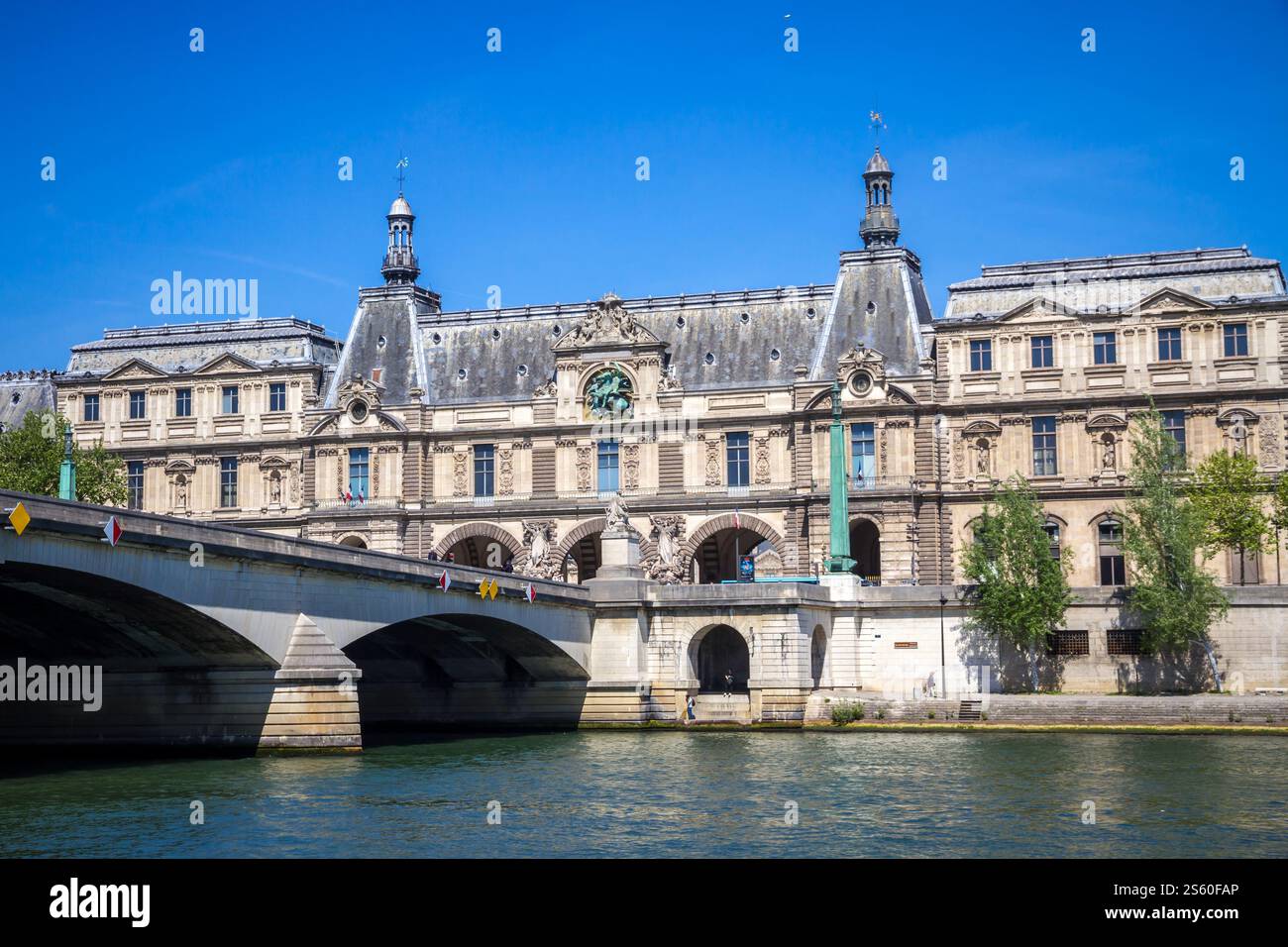 Louvre museum and Carrousel bridge view from the Seine river banks ...