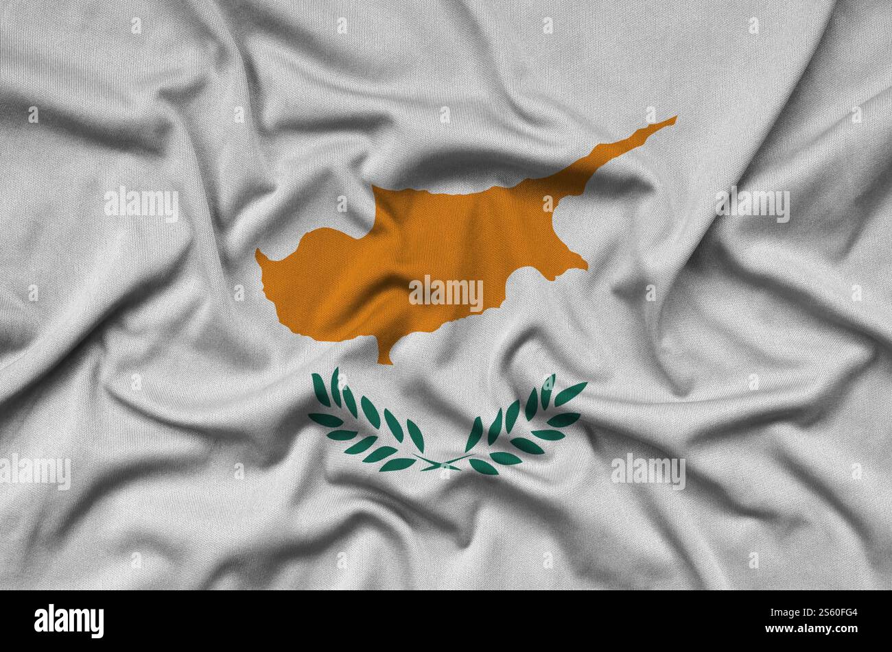 Cyprus flag is depicted on a sports cloth fabric with many folds. Sport ...