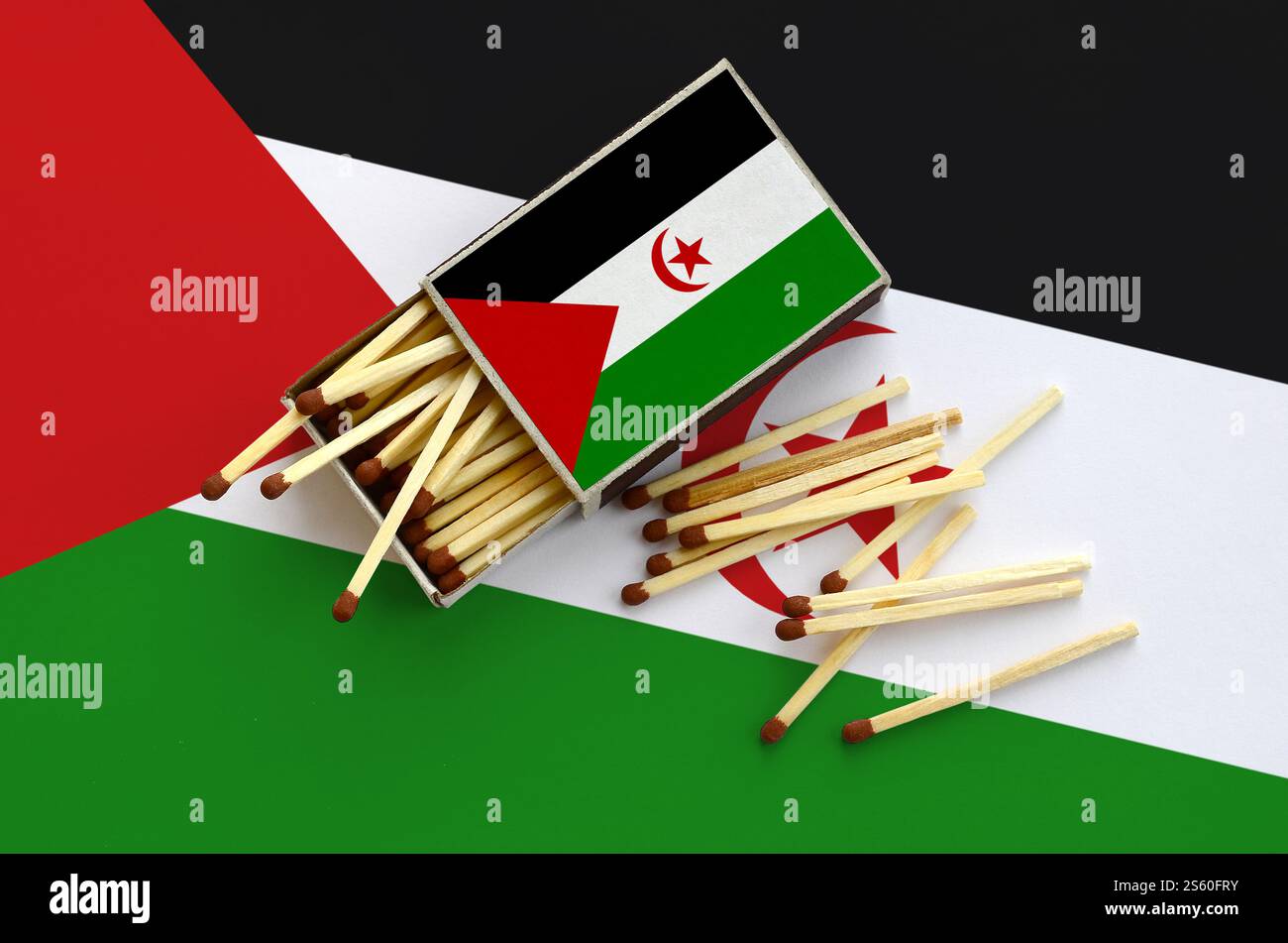 Western Sahara flag is shown on an open matchbox, from which several ...