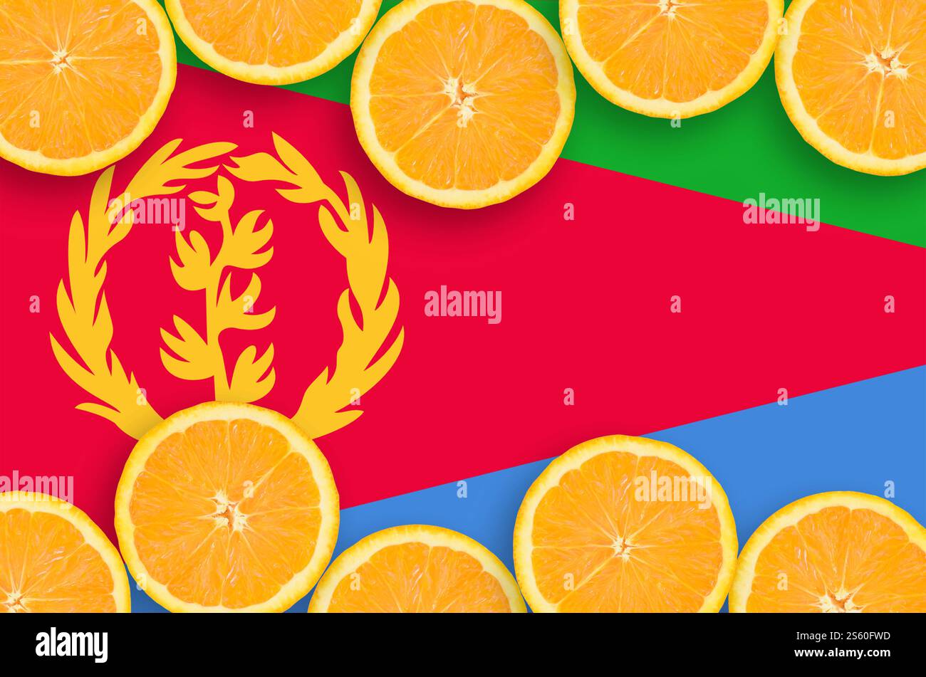 Eritrea flag in horizontal frame of orange citrus fruit slices. Concept ...