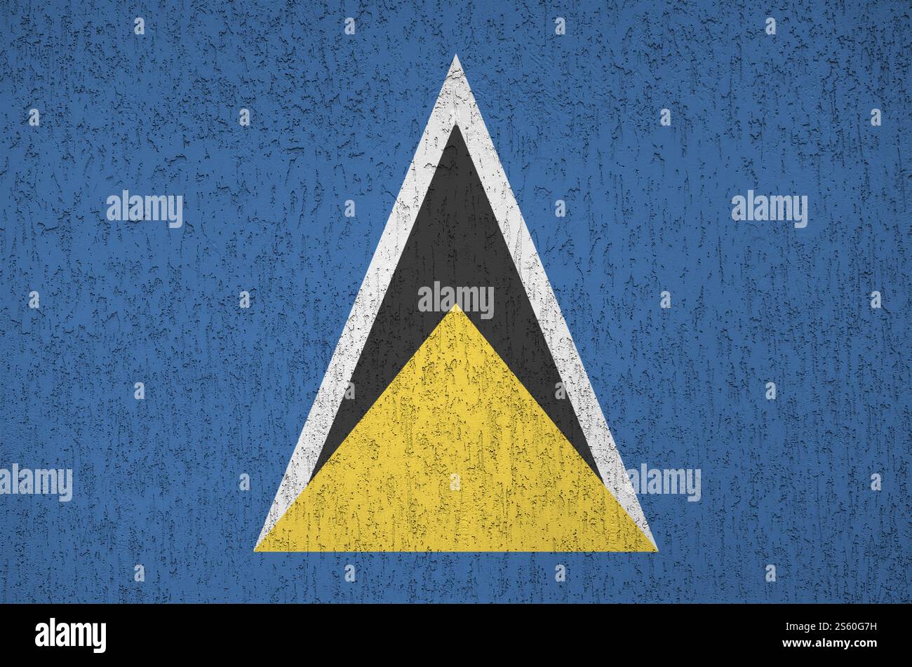 Saint Lucia flag depicted in bright paint colors on old relief ...