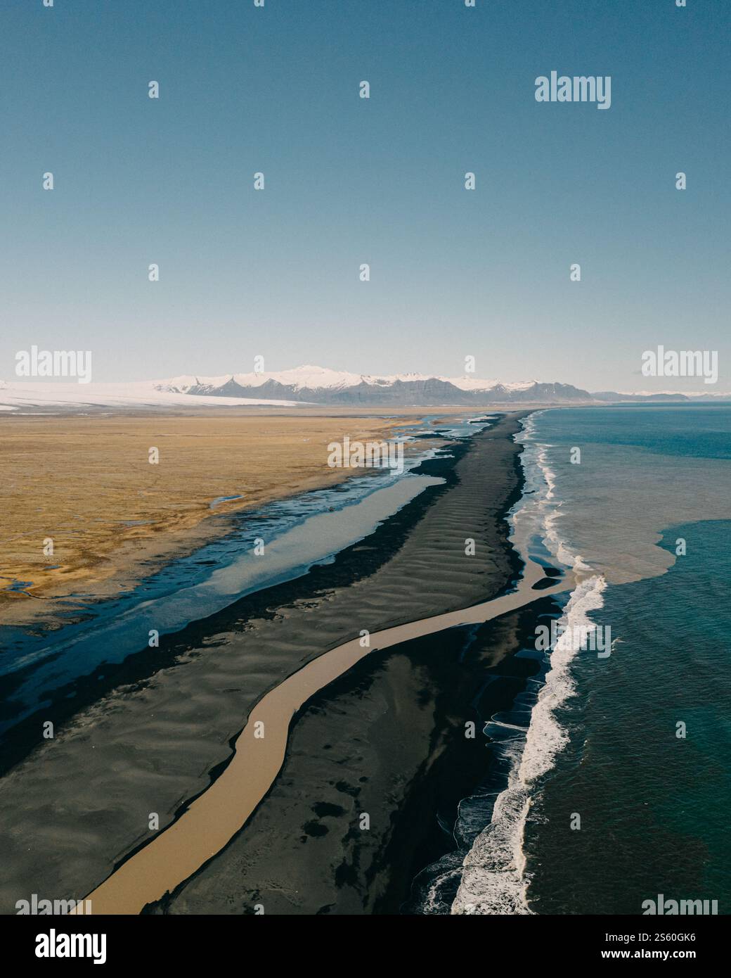 Aerial view of South Iceland's coastline with black sand beaches ...