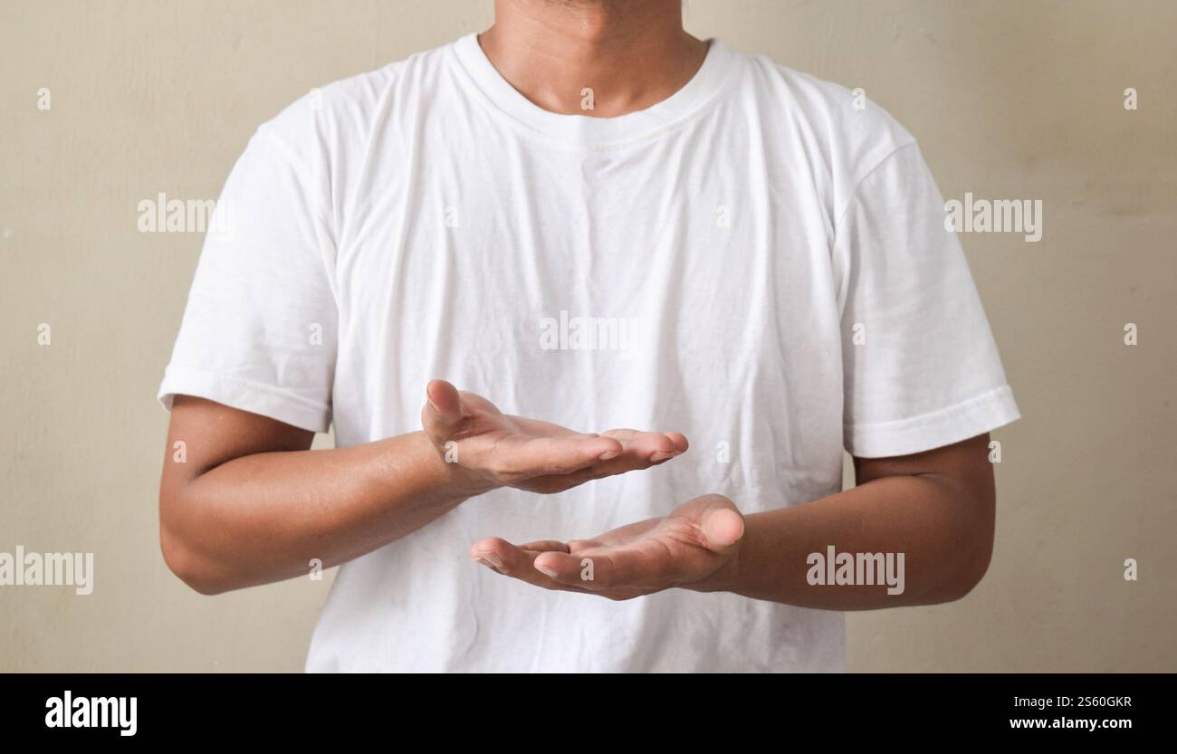young man showing sign language with hand gestures speaking body ...
