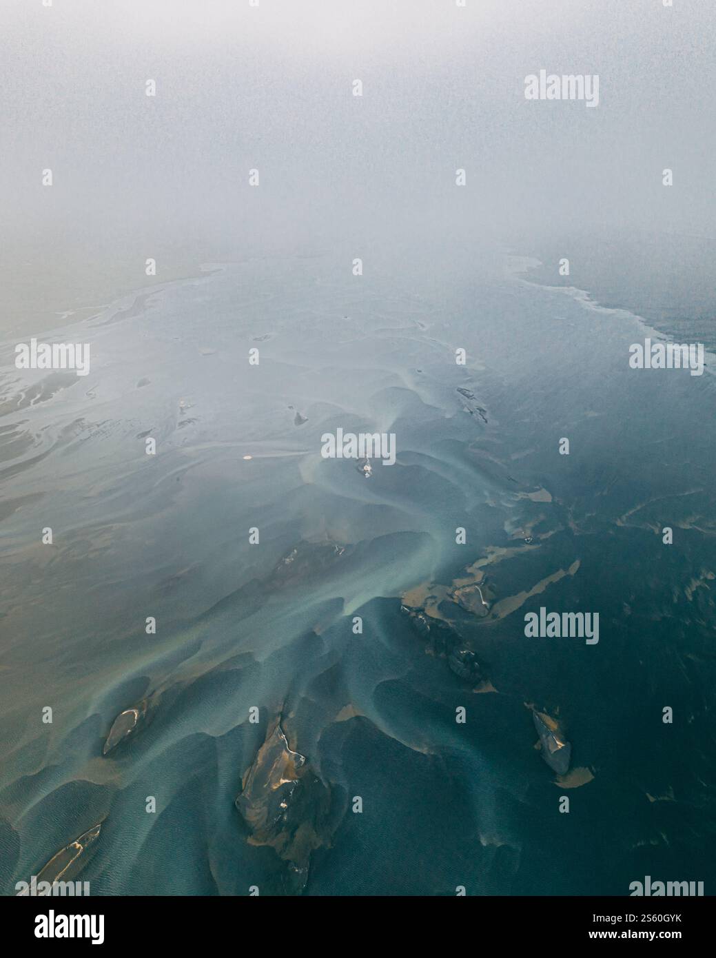 Aerial view of winding rivers and sand patterns in South Iceland's ...