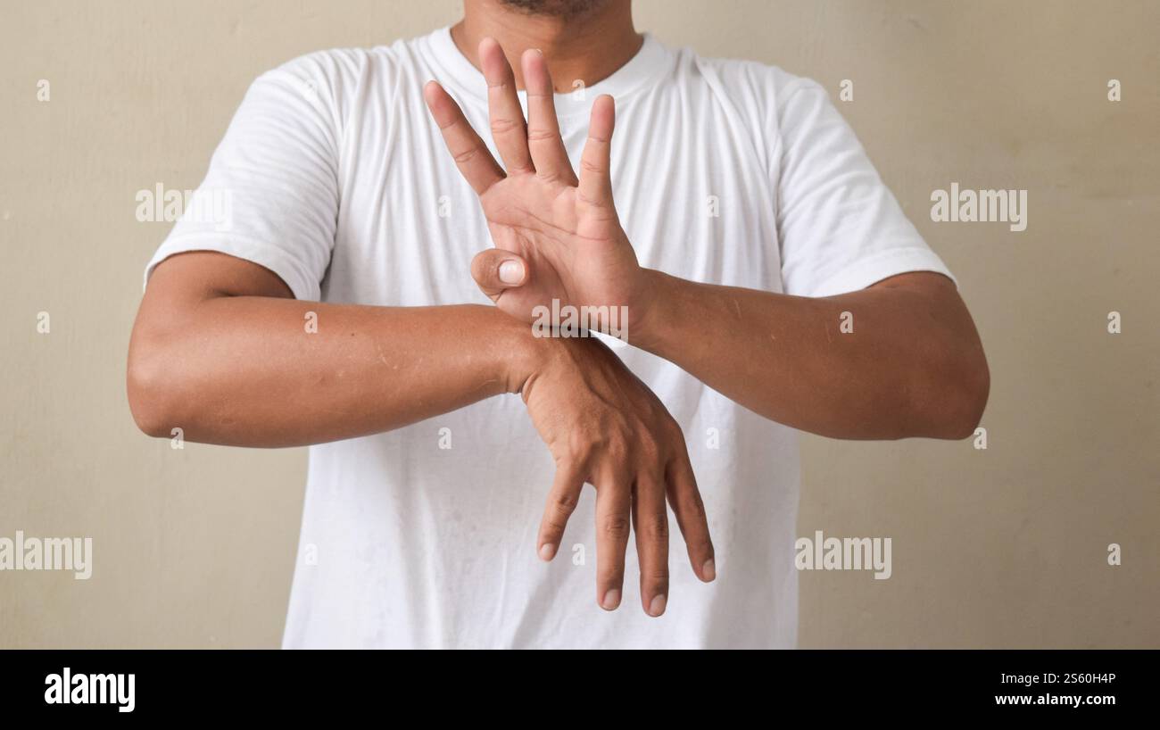young man showing sign language with hand gestures speaking body ...