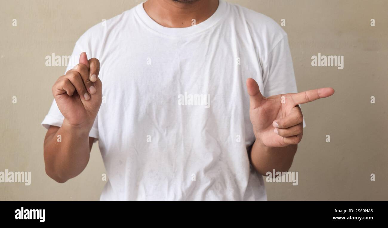 young man showing sign language with hand gestures speaking body ...