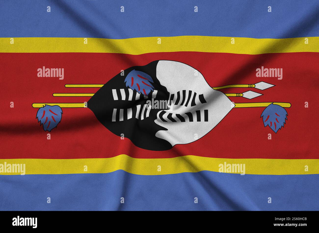 Swaziland flag is depicted on a sports cloth fabric with many folds ...