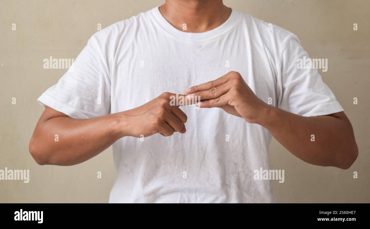 young man showing sign language with hand gestures speaking body ...