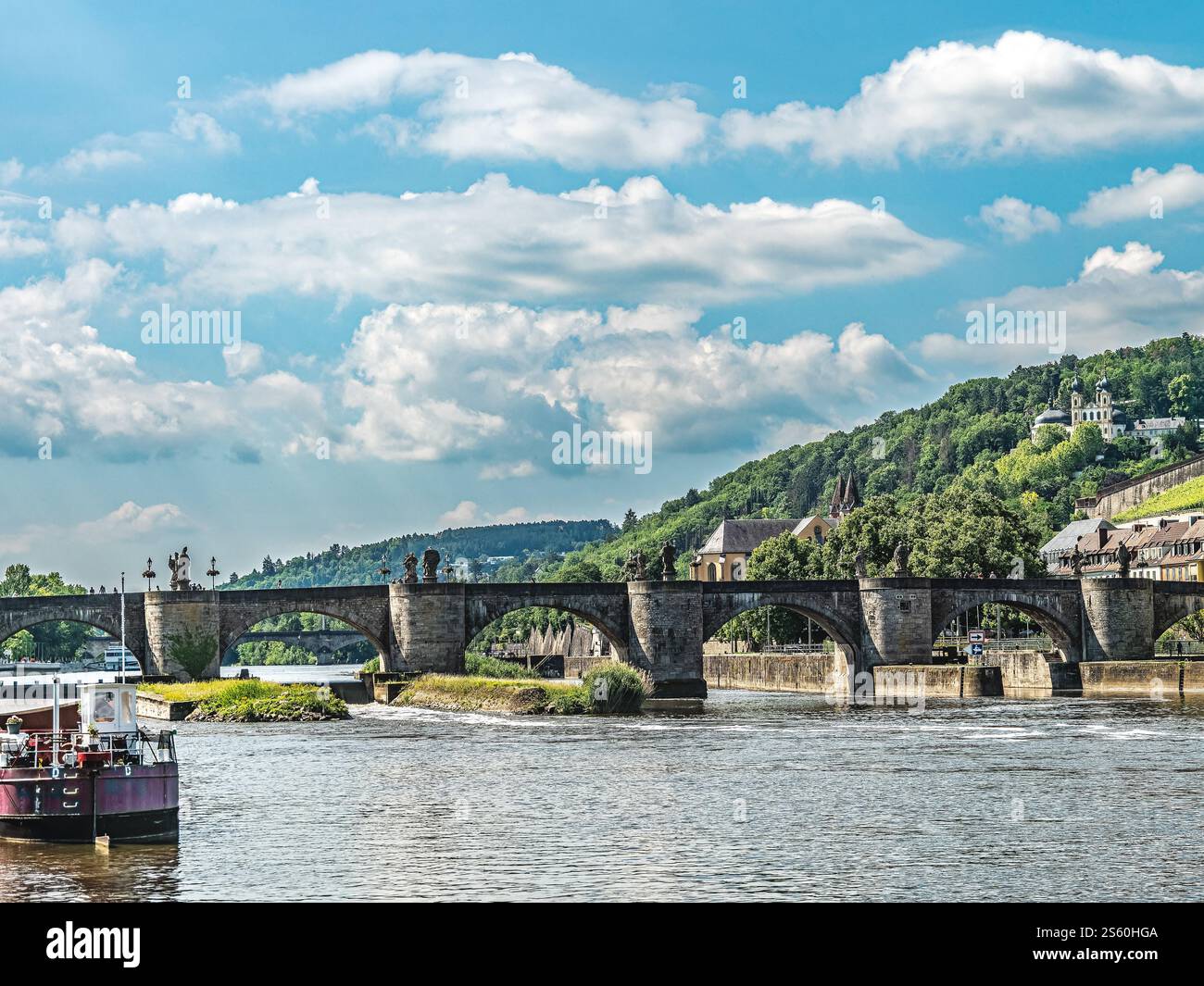 Picturesque landscape showcasing a charming riverside town, historic ...