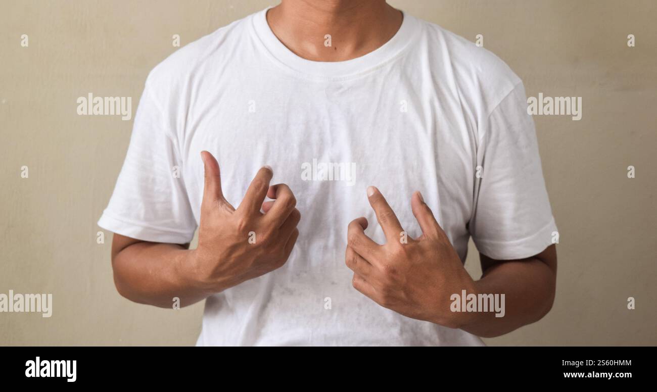 young man showing sign language with hand gestures speaking body ...