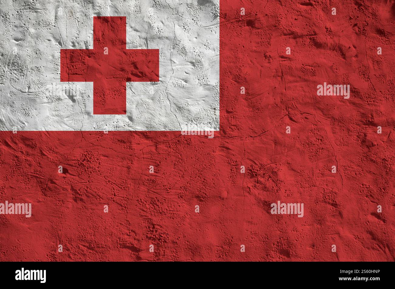 Tonga flag depicted in bright paint colors on old relief plastering ...