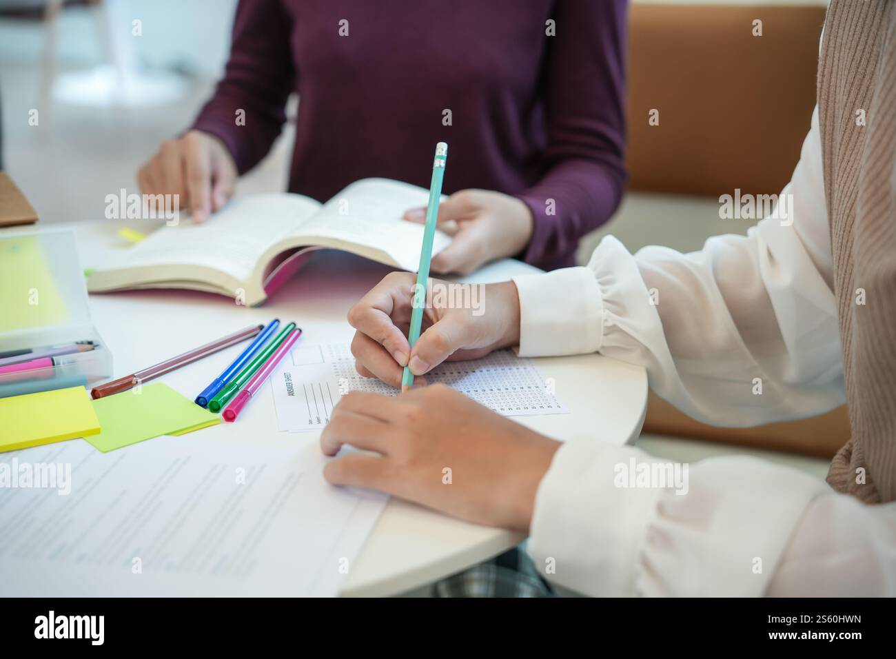 Learning with friends Young students campusHigh School Tutor for ...