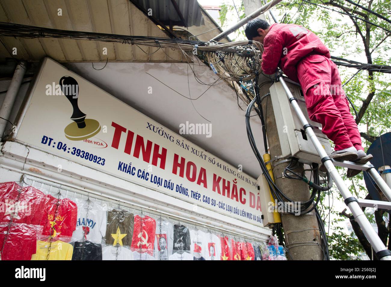 January 27, 2018 - Hanoi, Vietnam: Vietnamese electrician installing ...