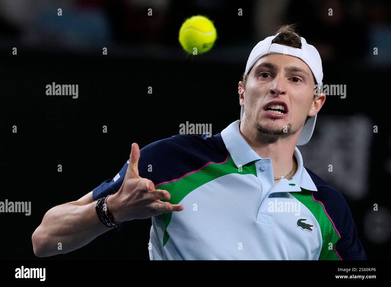 Ugo Humbert of France plays a forehand return to Hady Habib of Lebanon ...