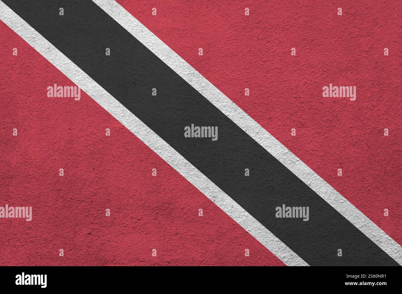 Trinidad and Tobago flag depicted in bright paint colors on old relief ...