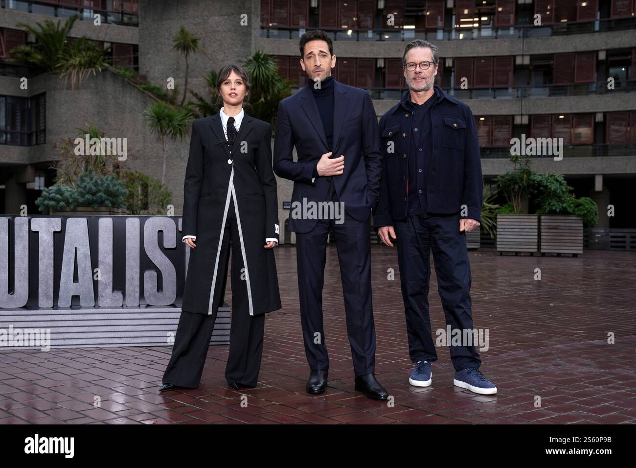 Felicity Jones, from left, Adrien Brody and Guy Pearce pose for photographers upon arrival at ...