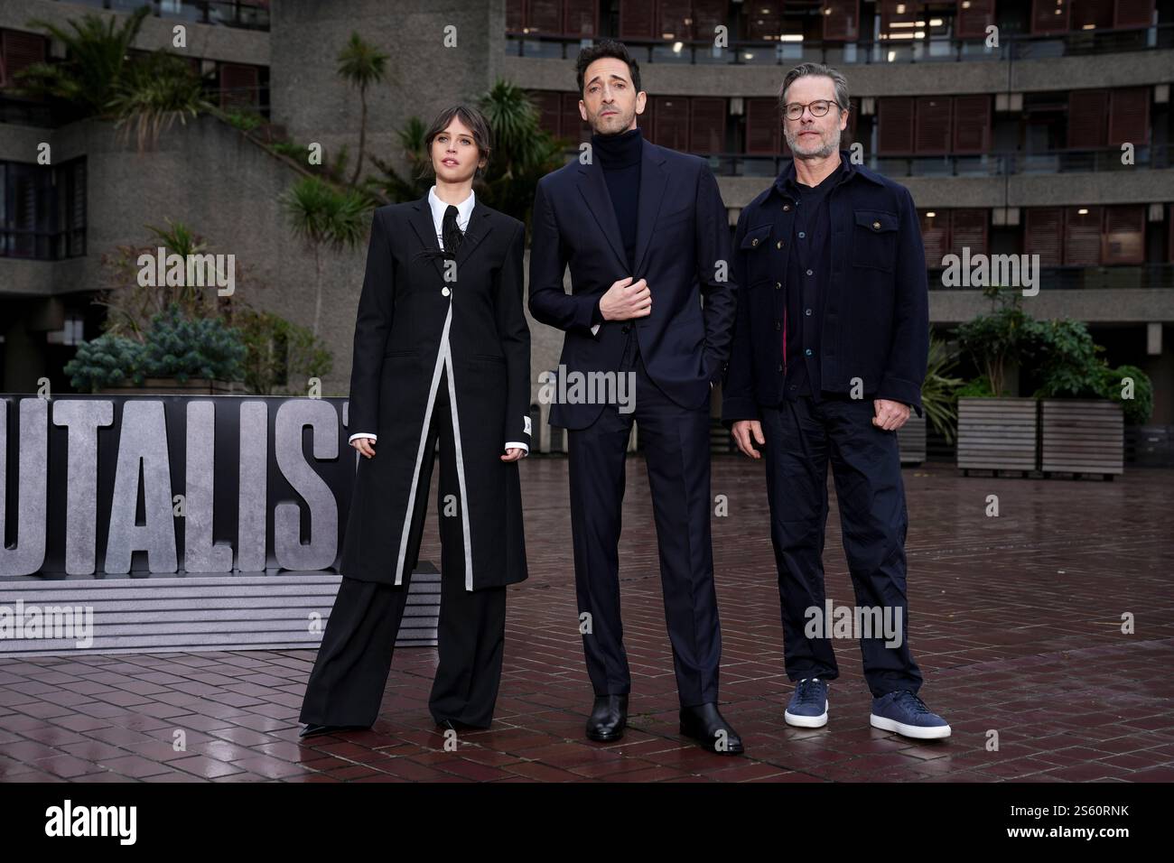 Felicity Jones, from left, Adrien Brody and Guy Pearce pose for photographers upon arrival at ...