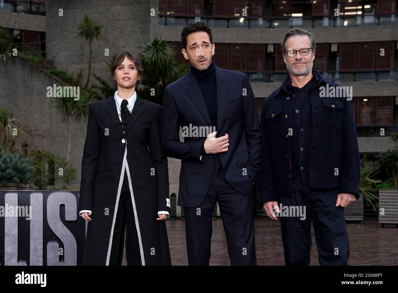 Felicity Jones, from left, Adrien Brody and Guy Pearce pose for photographers upon arrival at ...