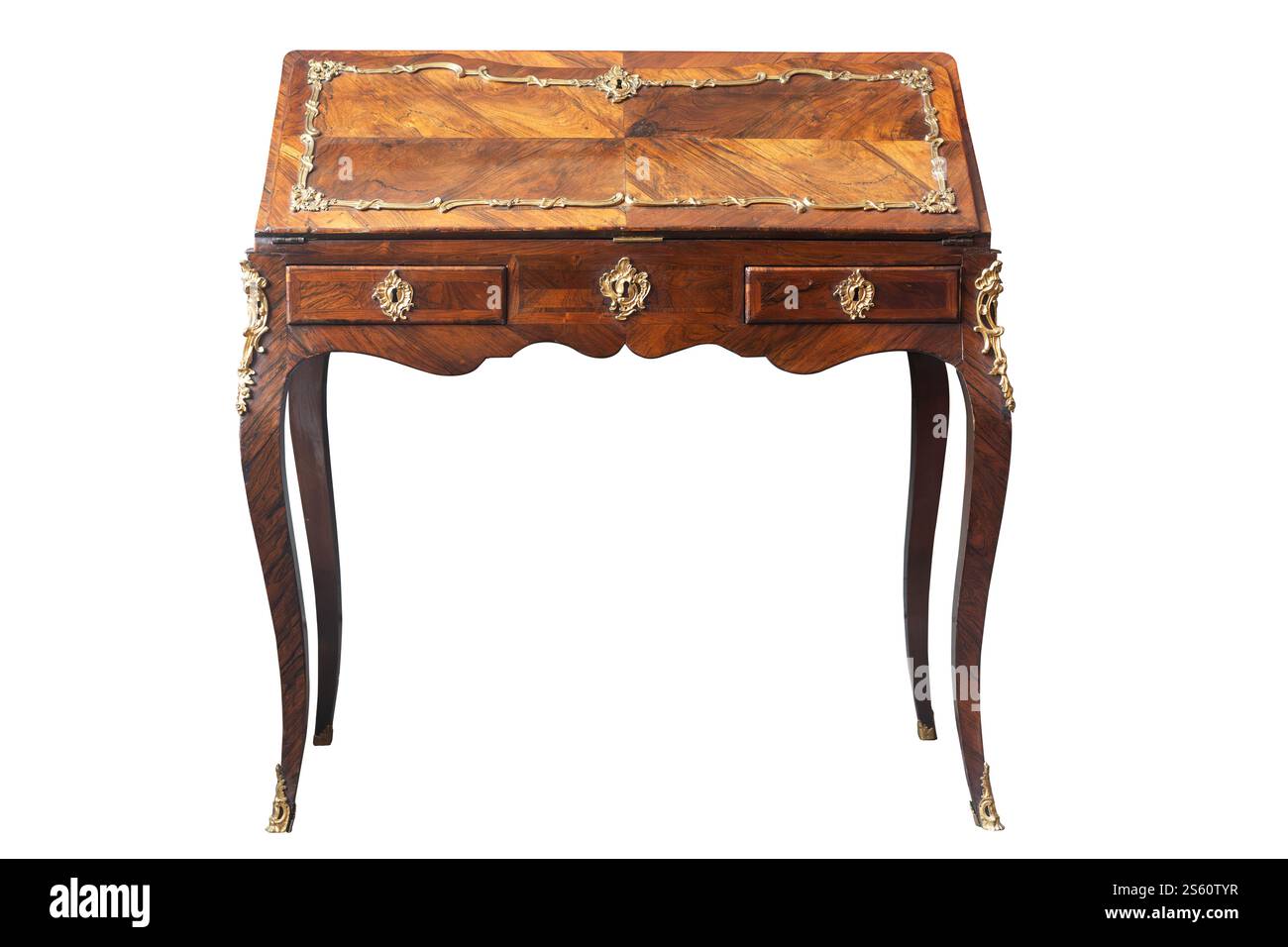 An antique writing desk with ornate carvings and a polished finish ...