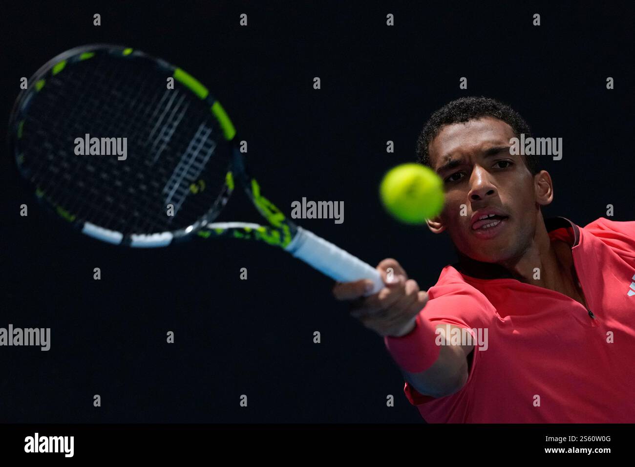 Felix Auger-Aliassime of Canada plays a forehand return to Alejandro Davidovich Fokina of Spain ...