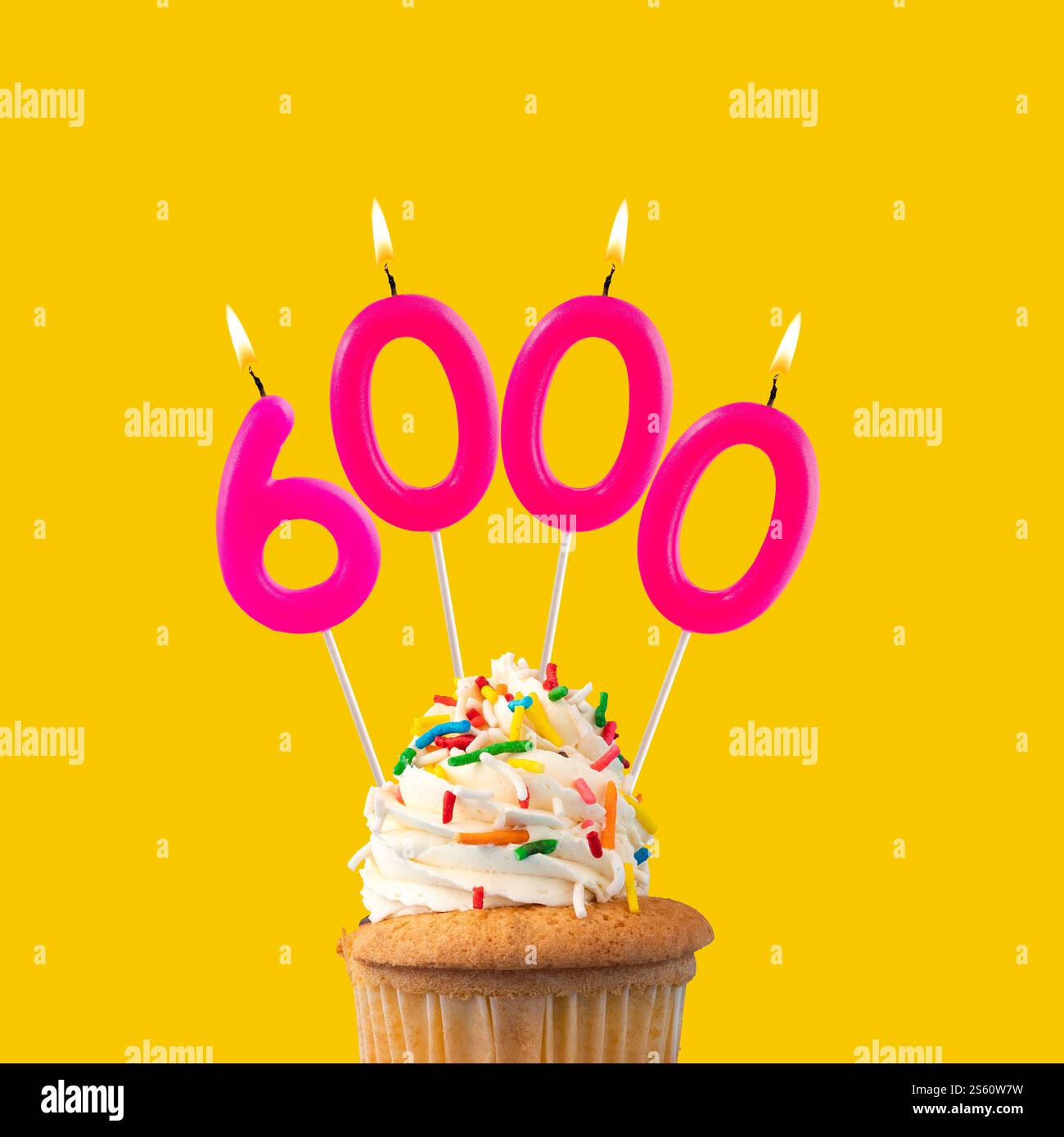 Candles forming the number 6000 - Yellow background Stock Photo - Alamy