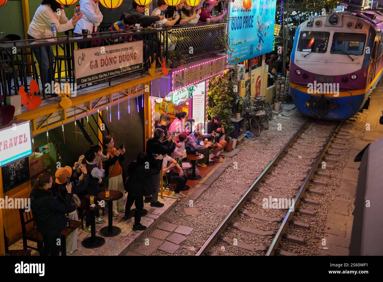 A locomotive pulls into the Train Street at the Old Quarter of Hanoi in ...