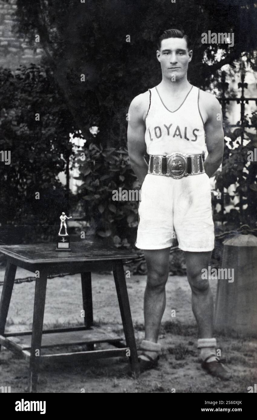 An army boxer from the Loyal Regiment (North Lancashire) with a belt ...