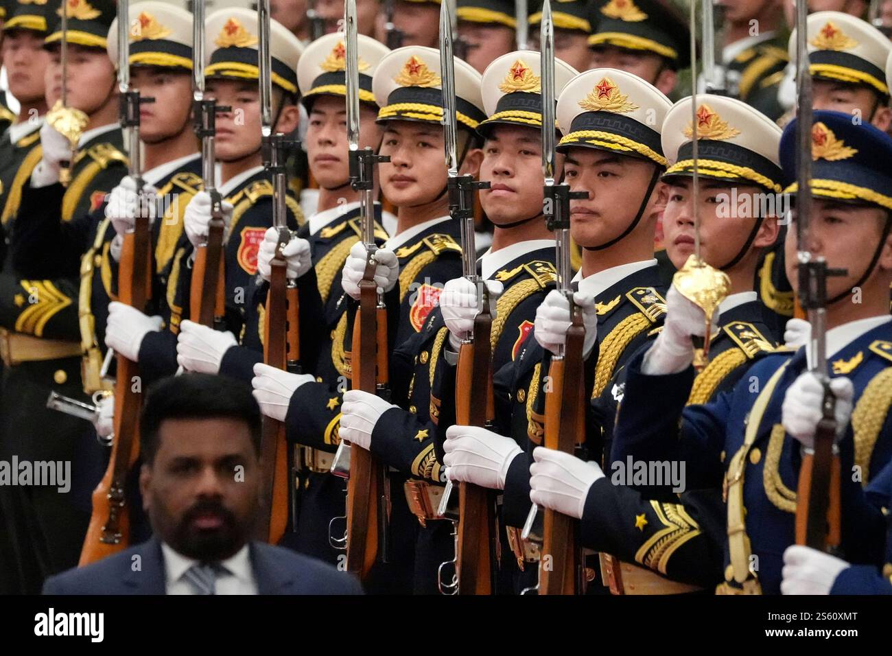 Chinese honor guards stand at attention during arrival ceremonies ...